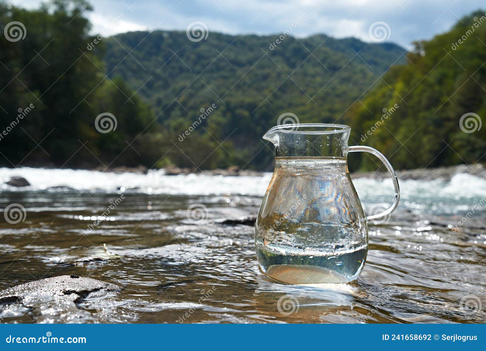 Pitcher of Clean River Water Stock Photo - Image of fresh, drinkable ...