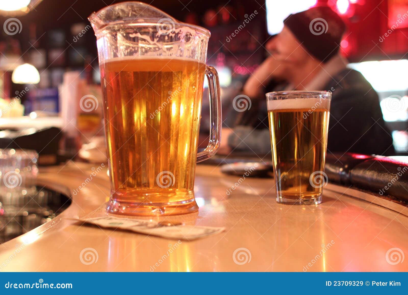 Pitcher and glass of beer stock image. Image of pilsner - 23709329
