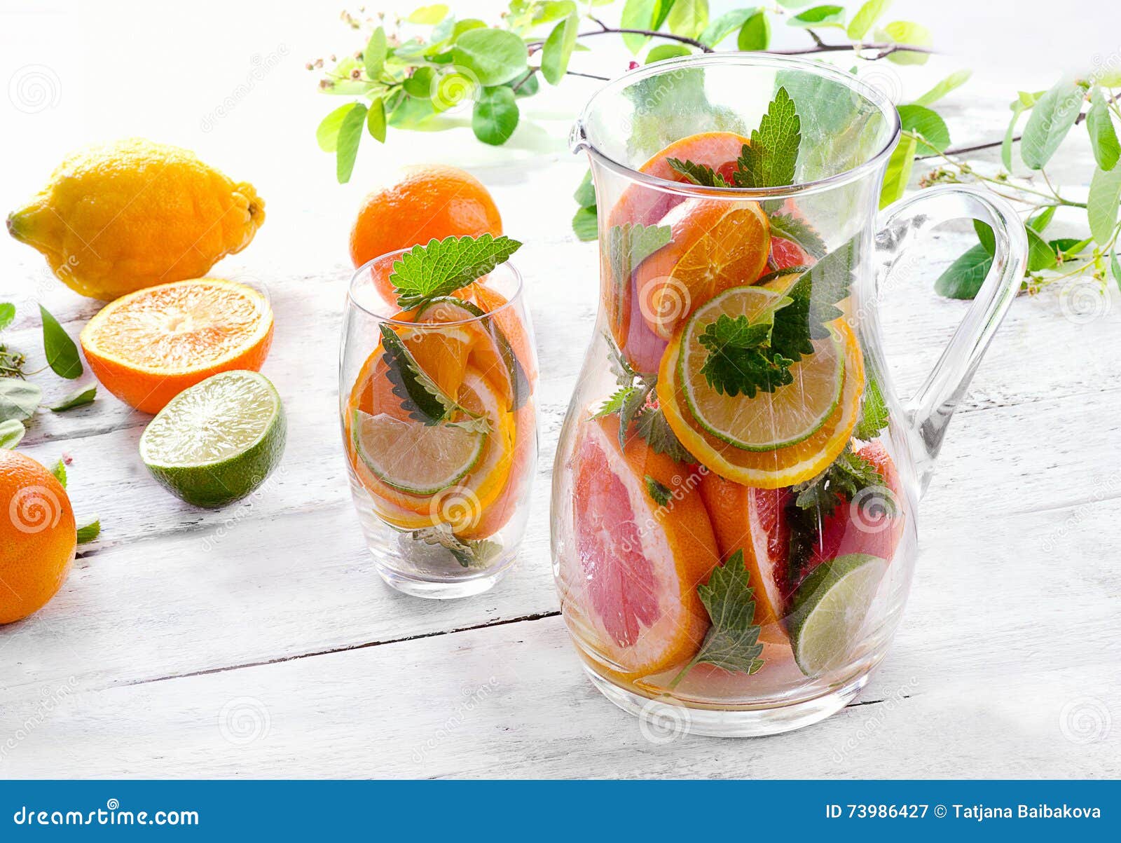 Pitcher and Glass with Citrus Fruits Stock Image - Image of wooden ...