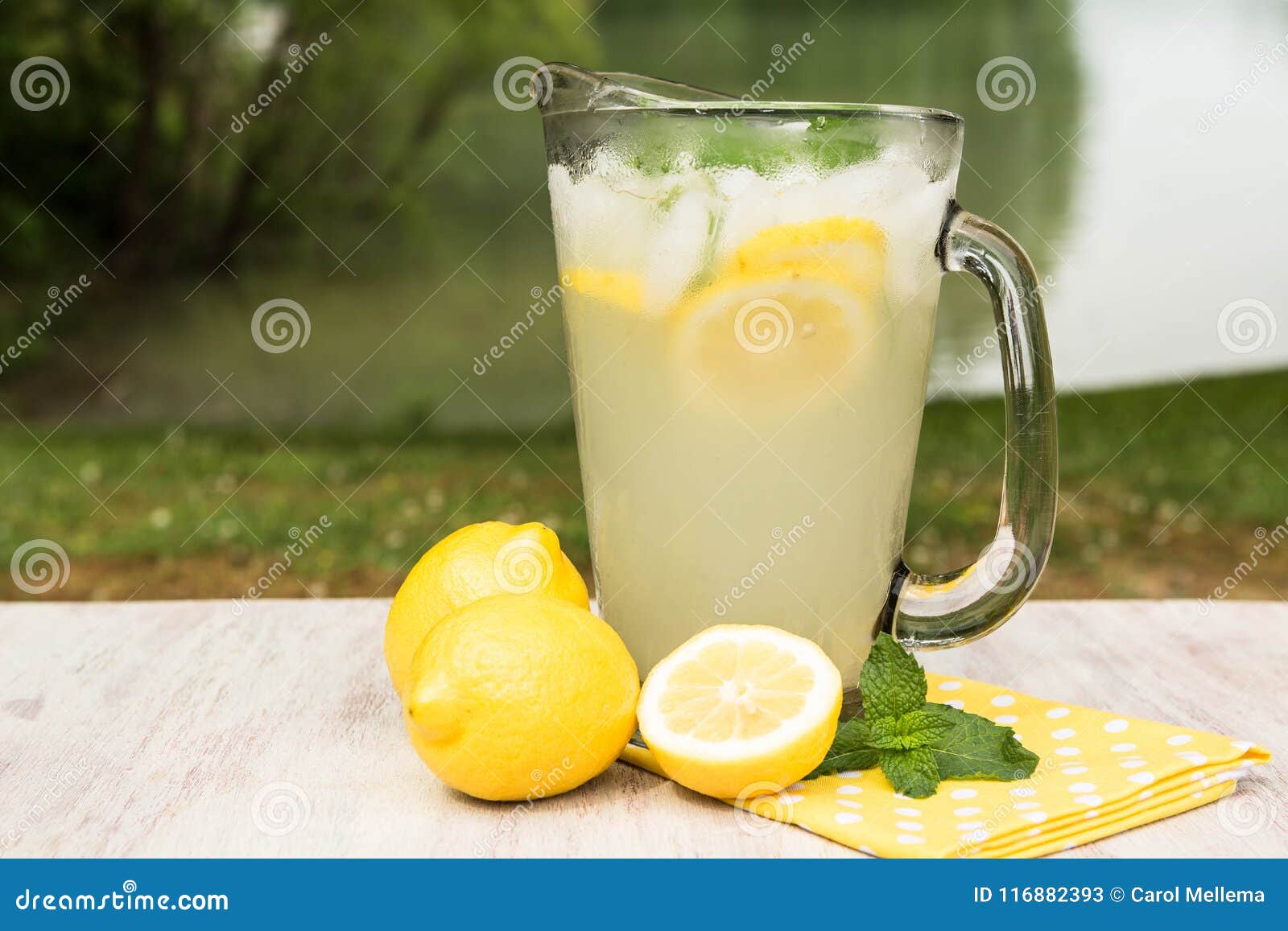 Pitcher of Lemonade Next To Lake Stock Image - Image of relax, sliced ...