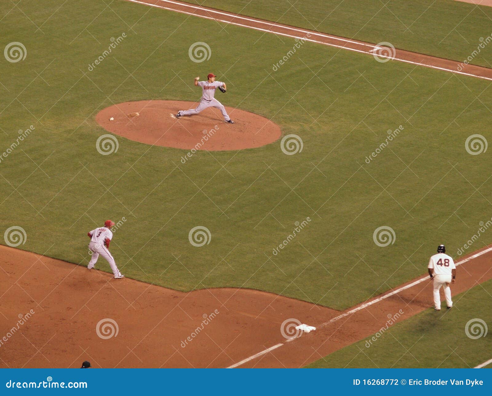 Pitcher Steps Forward To Throw As Runner Take Lead Editorial ...