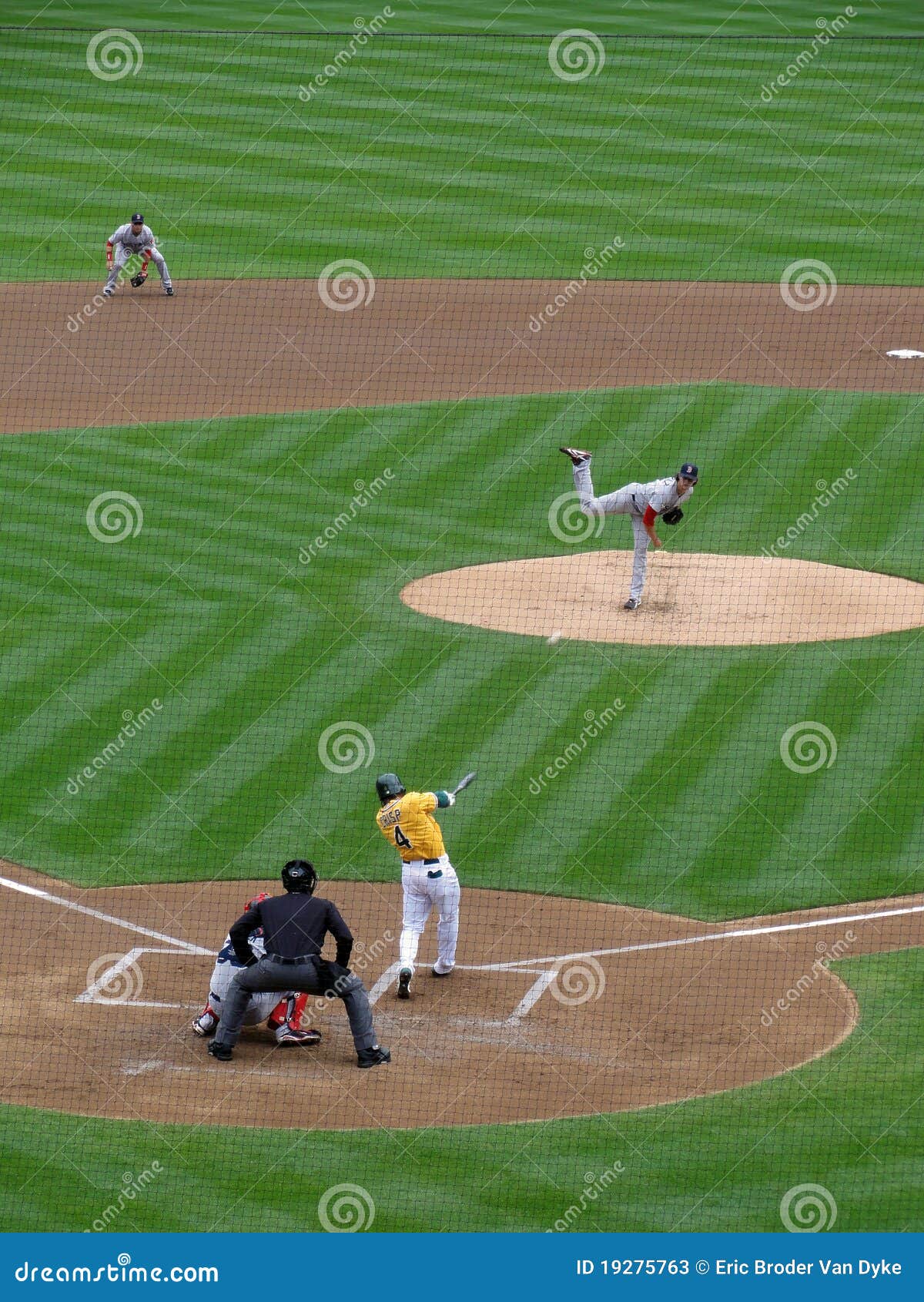 Pitcher Throws Pitch To Batter with Ball in Air Editorial Stock Photo ...