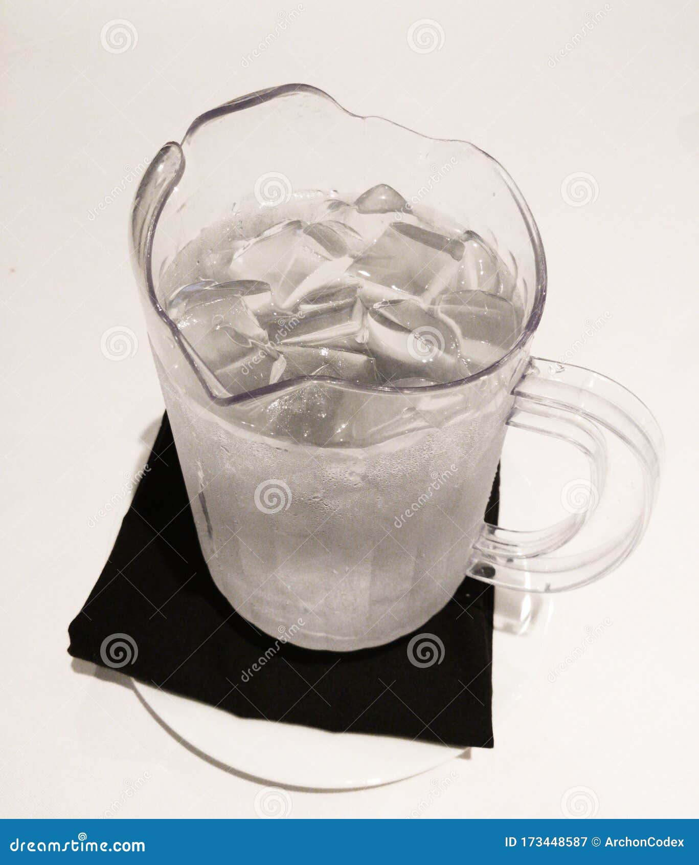 Pitcher with Water and Ice on White Table Stock Image - Image of fresh ...