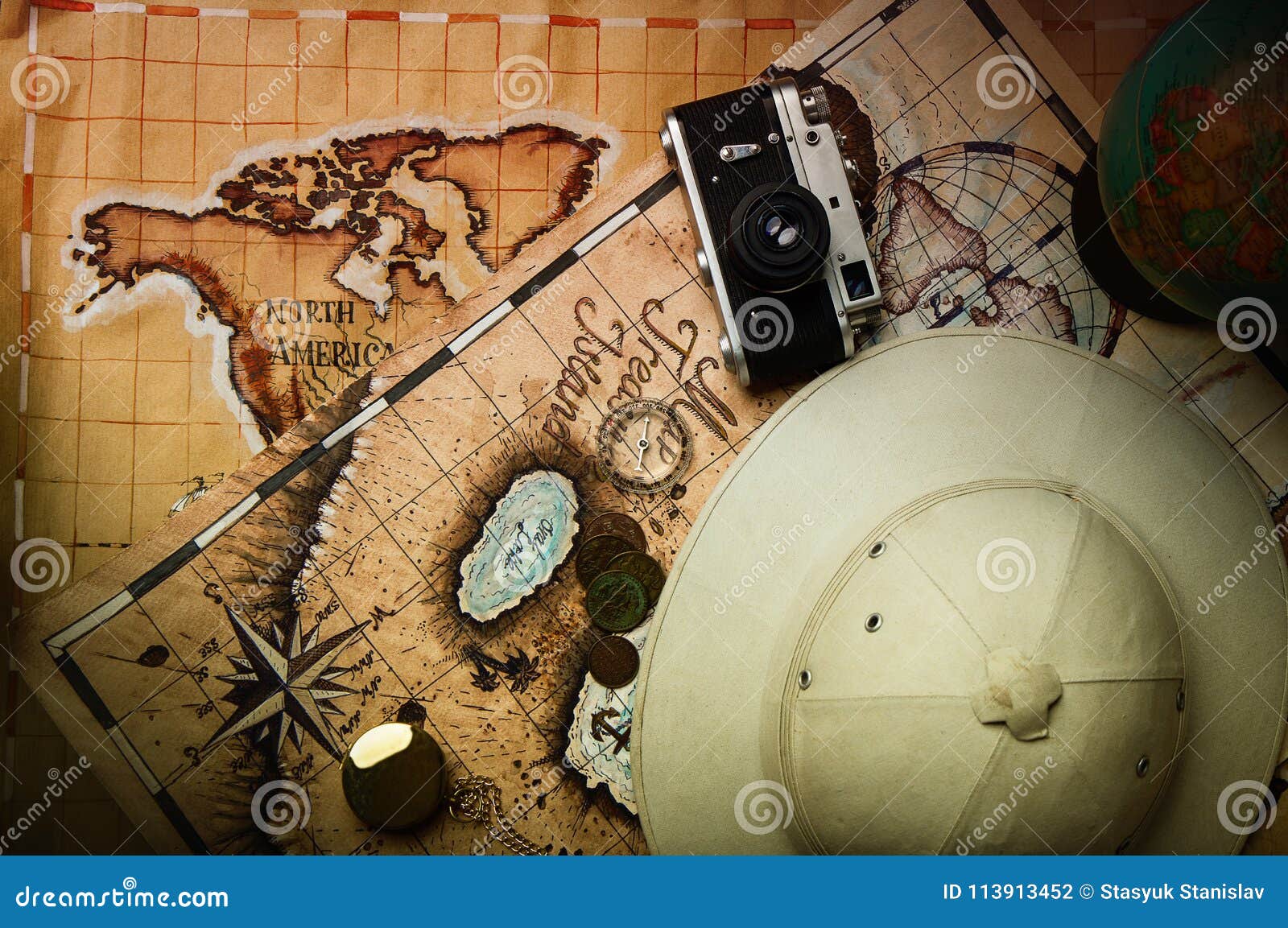 Pith helmet and maps stock photo. Image of headgear - 113913452