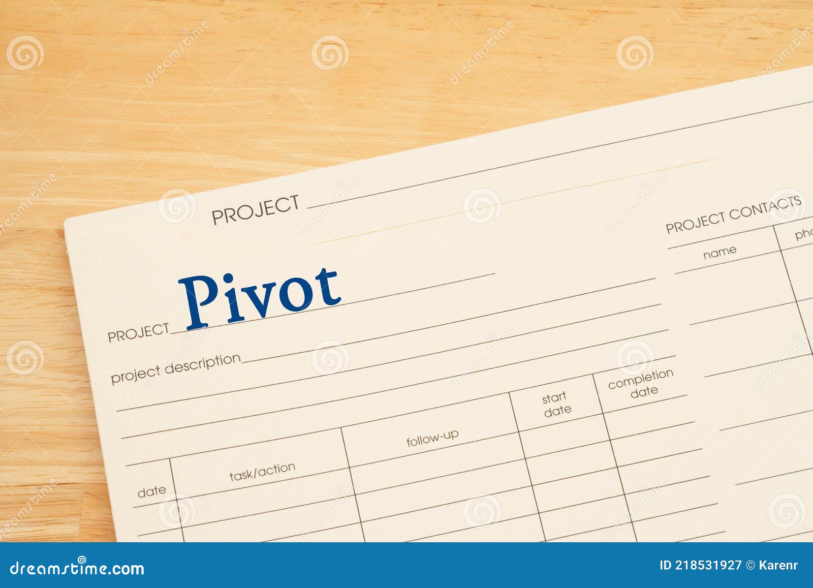 Pivot Project Plan Folder on a Wood Desk Stock Image - Image of project ...