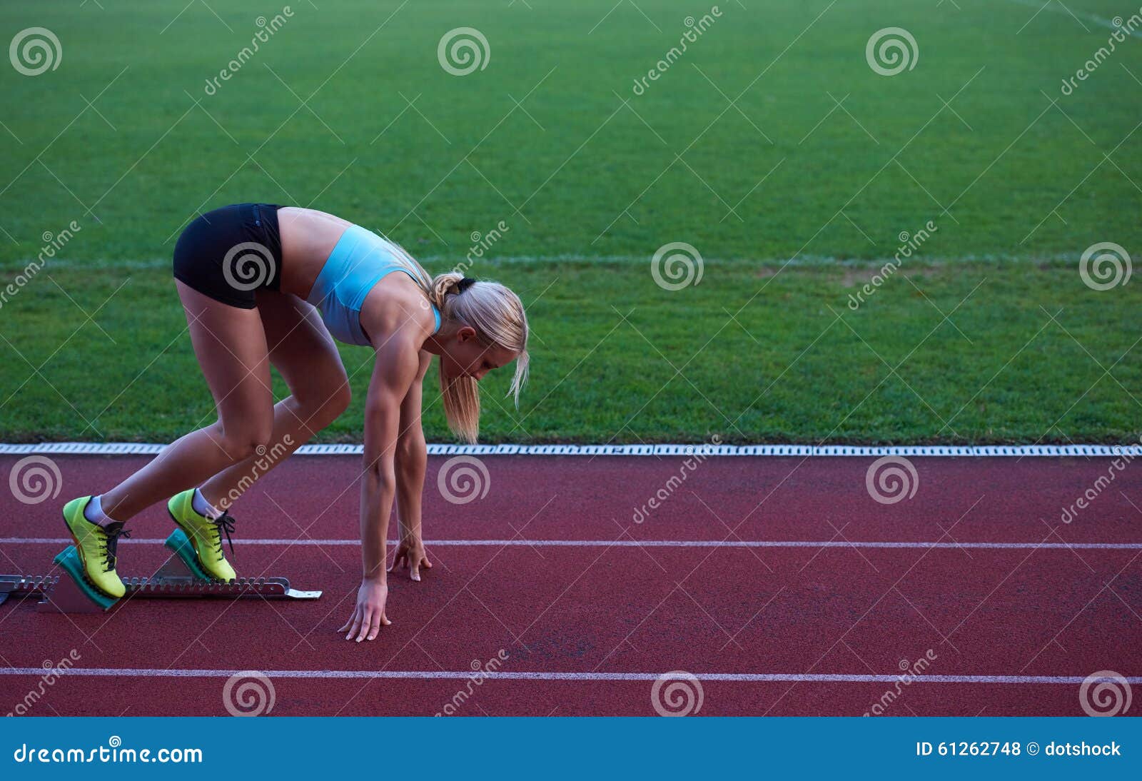 Pixelated Design of Woman Sprinter Leaving Starting Blocks Stock Photo ...