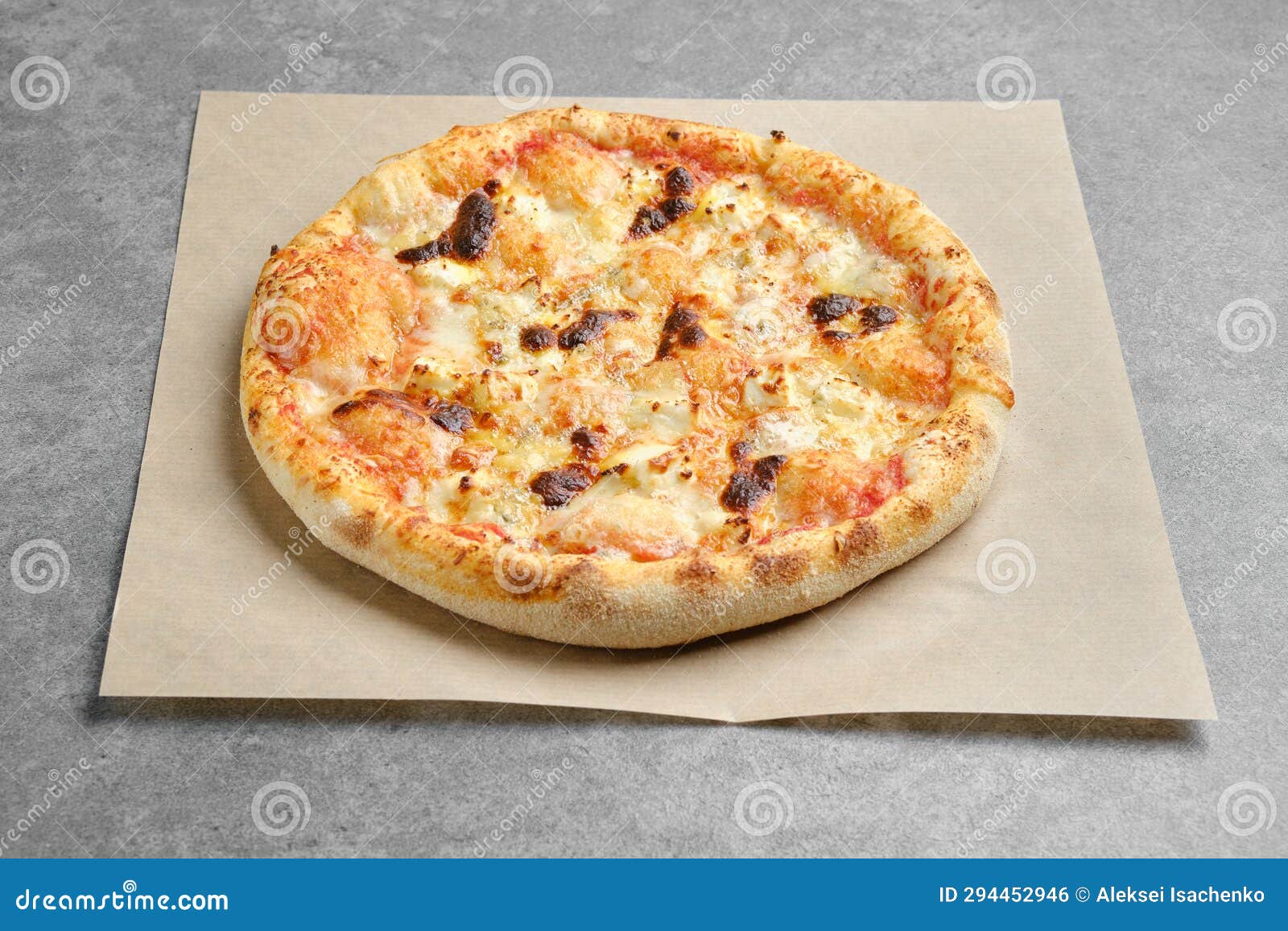 Pizza with Assortment of Cheese on Parchment Paper Stock Photo - Image ...