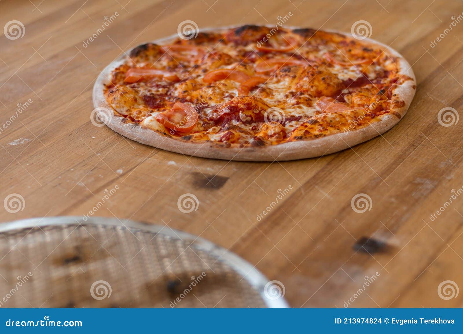 Pizza and Baking Grid on a Cutting Board Stock Photo - Image of crust ...