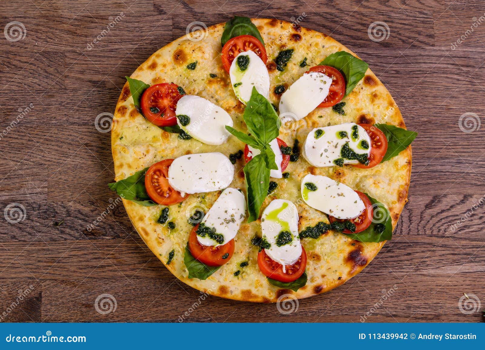 Pizza Caprese with basil stock photo. Image of fresh - 113439942