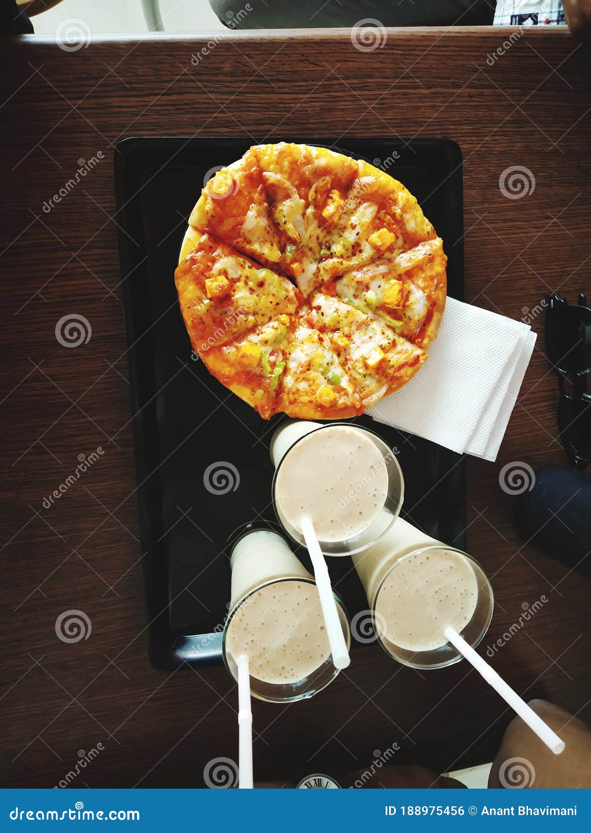 Pizza with cold coffee stock photo. Image of produce - 188975456