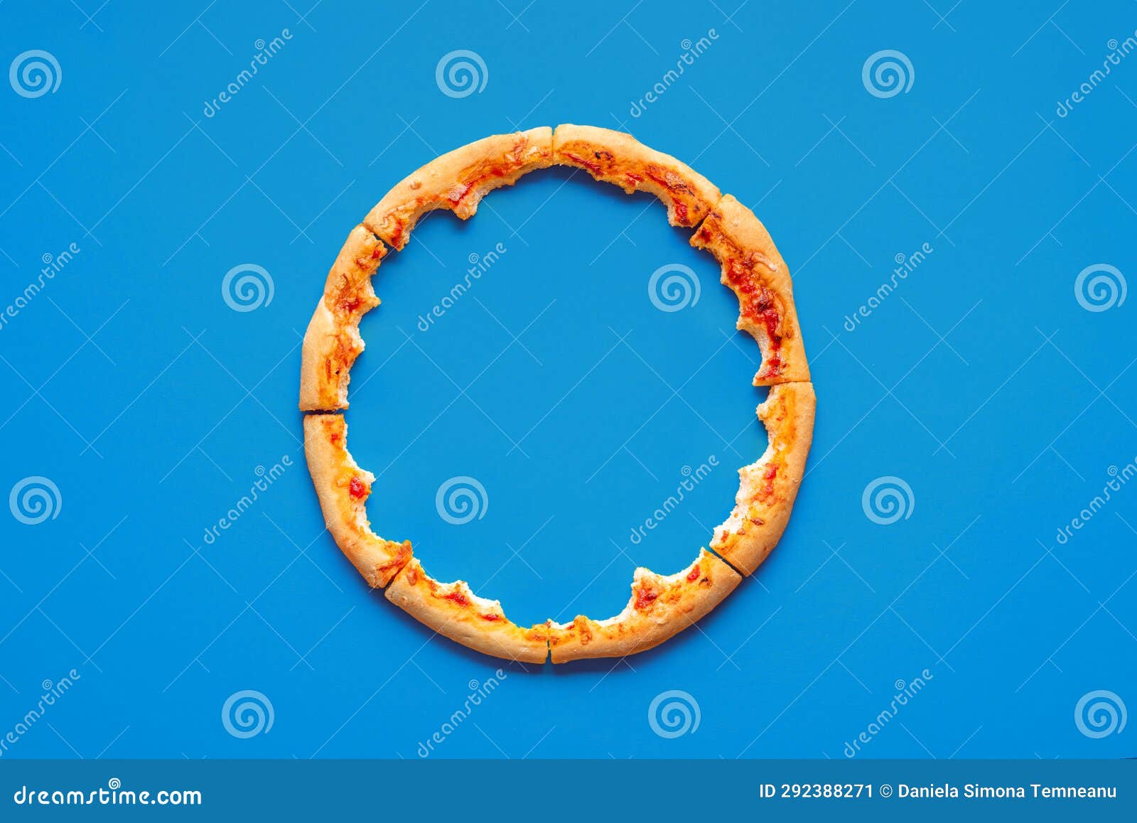 Pizza Crust Leftovers Top View on a Blue Background Stock Image - Image ...