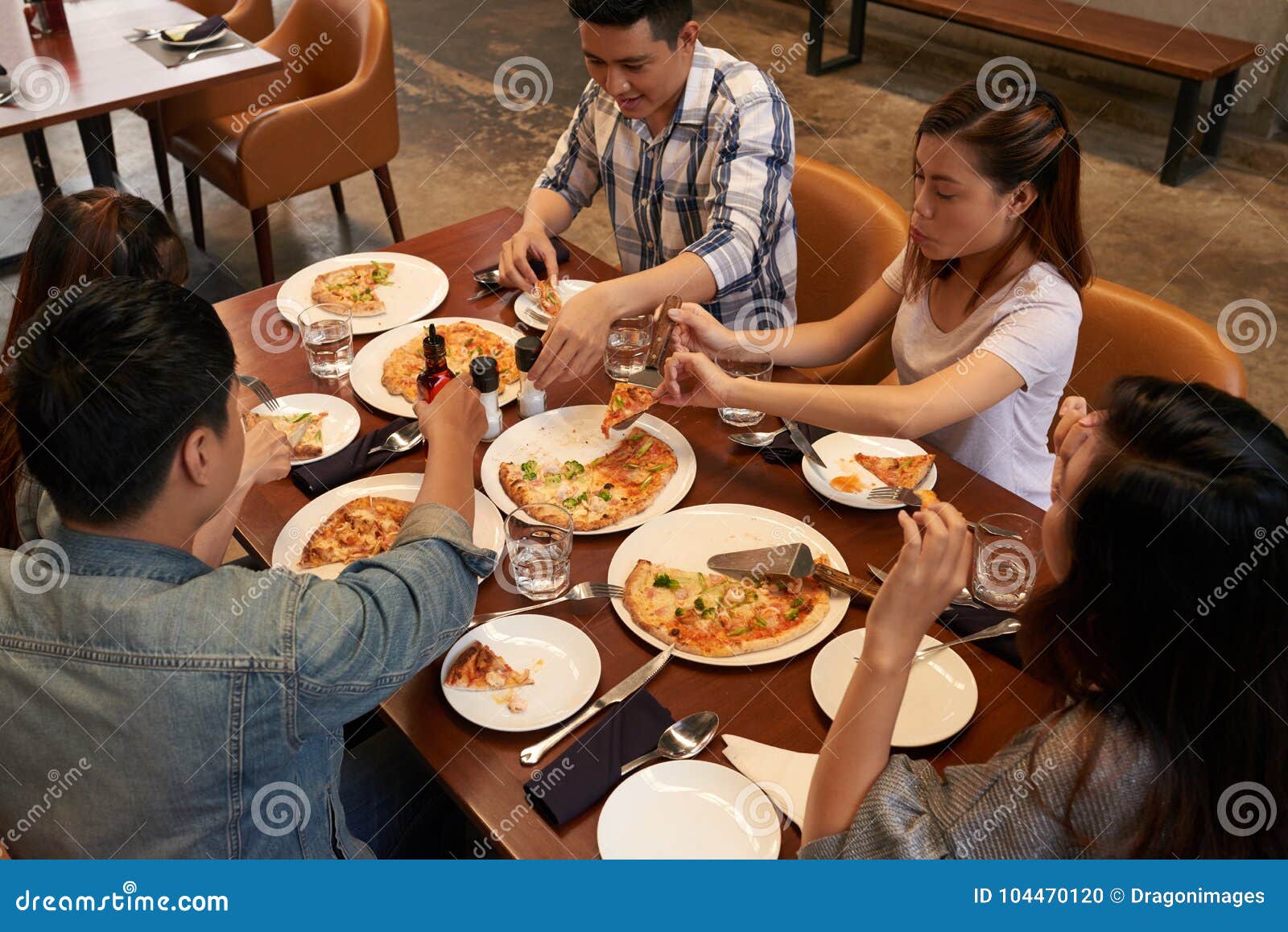 Pizza with friends stock photo. Image of happy, young - 104470120