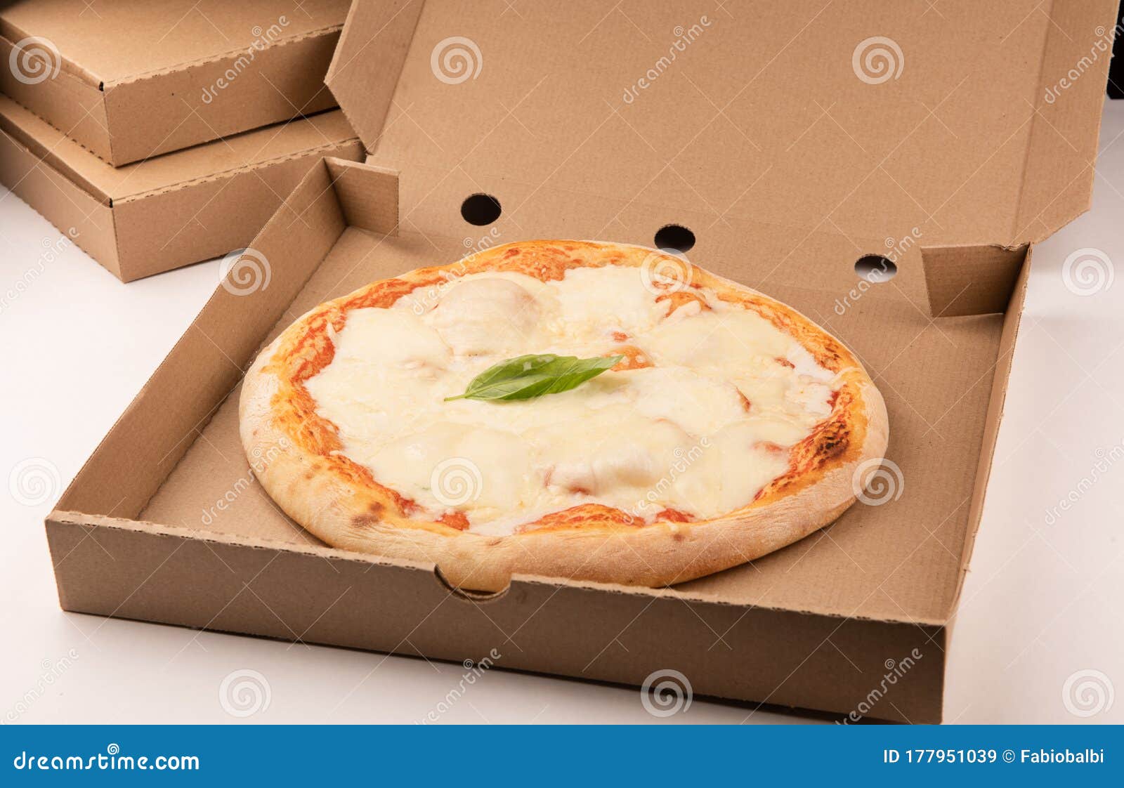 Pizza Inside Open Box on Tall Stack of Delivery Boxes Stock Image ...