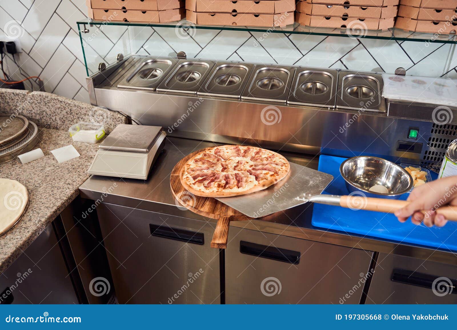 Pizza in Kitchen Amoung Stacks of Pizzas Stock Photo - Image of kitchen ...