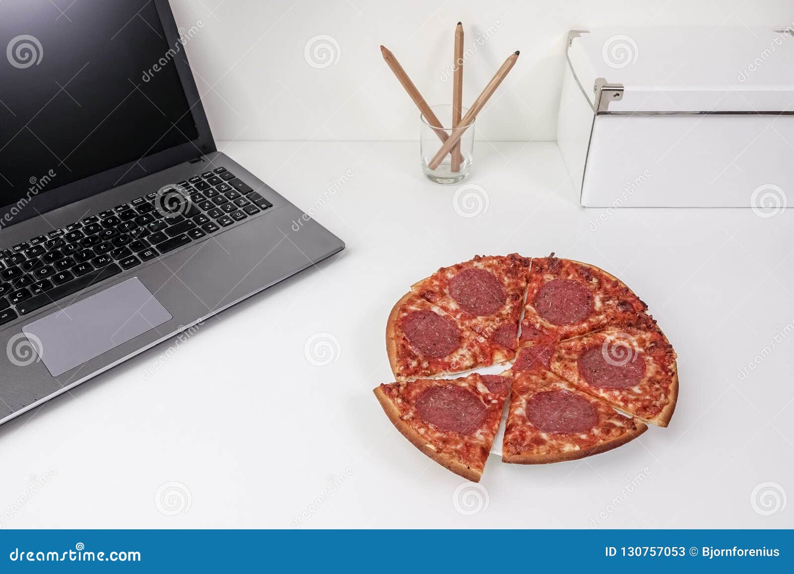 Pizza and Laptop Computer in White Modern Office Workspace. Stock Image ...