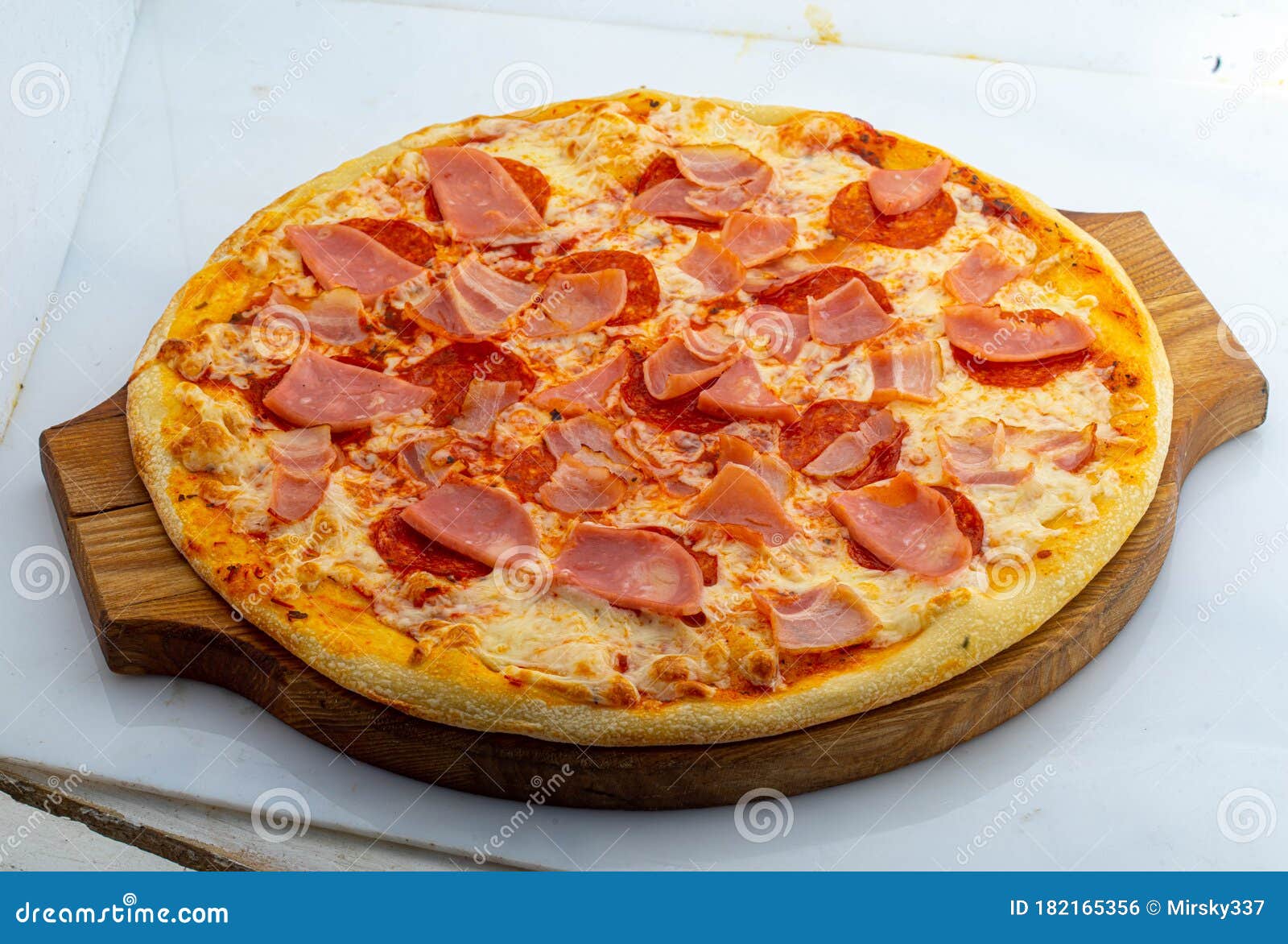 Pizza with Pepperoni and Ham Stock Photo - Image of pepper, cooked ...