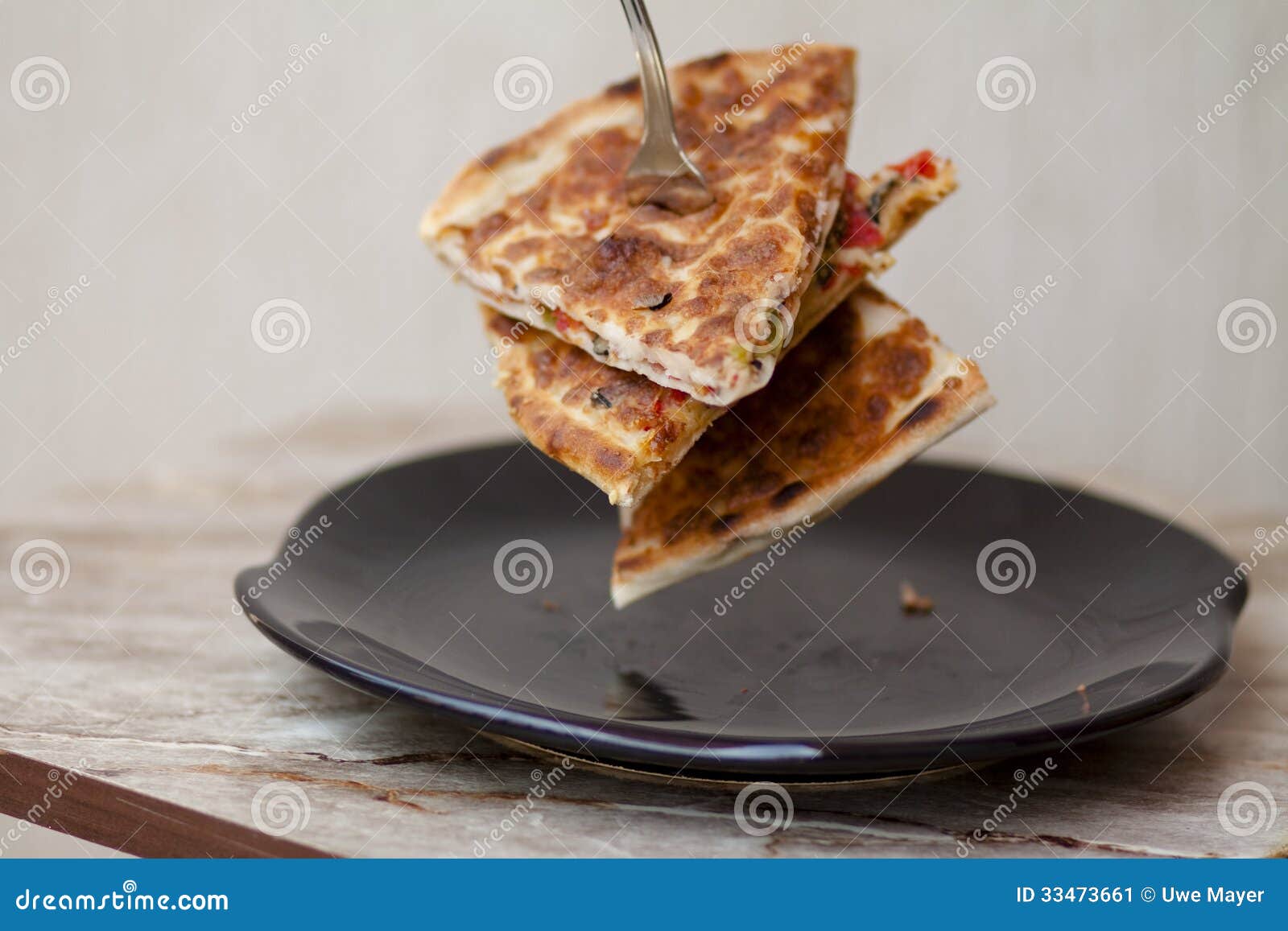 Pizza pieces on fork stock image. Image of tasty, hand - 33473661