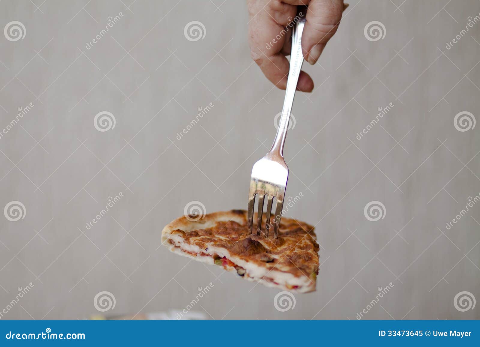Pizza pieces with fork stock image. Image of finger, piece - 33473645