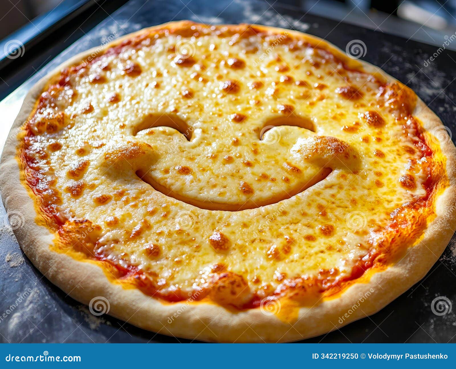 A Pizza with a Smiley Face on Top of it Stock Photo - Image of topping ...