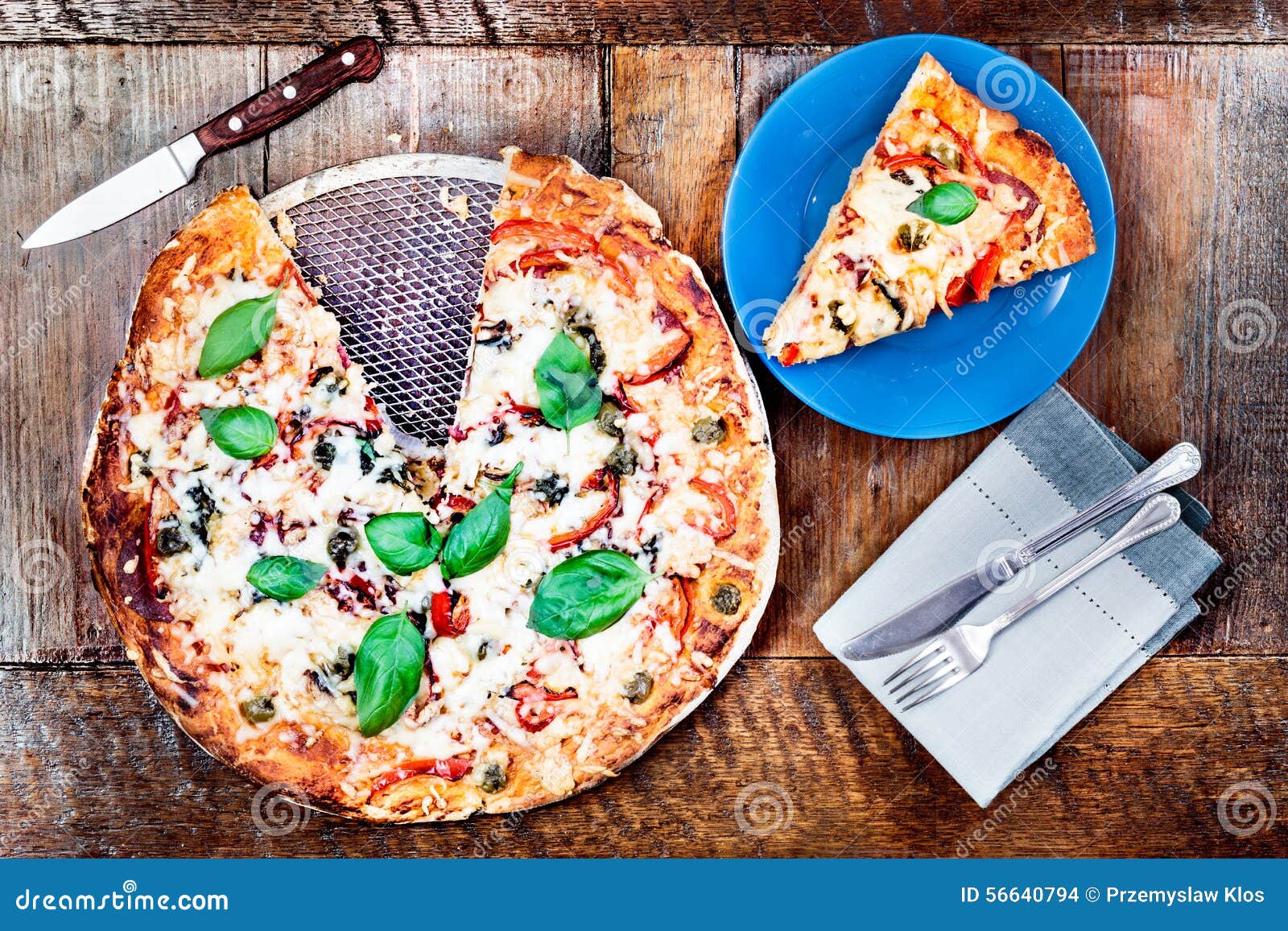 Pizza on a table stock photo. Image of plate, dinner - 56640794