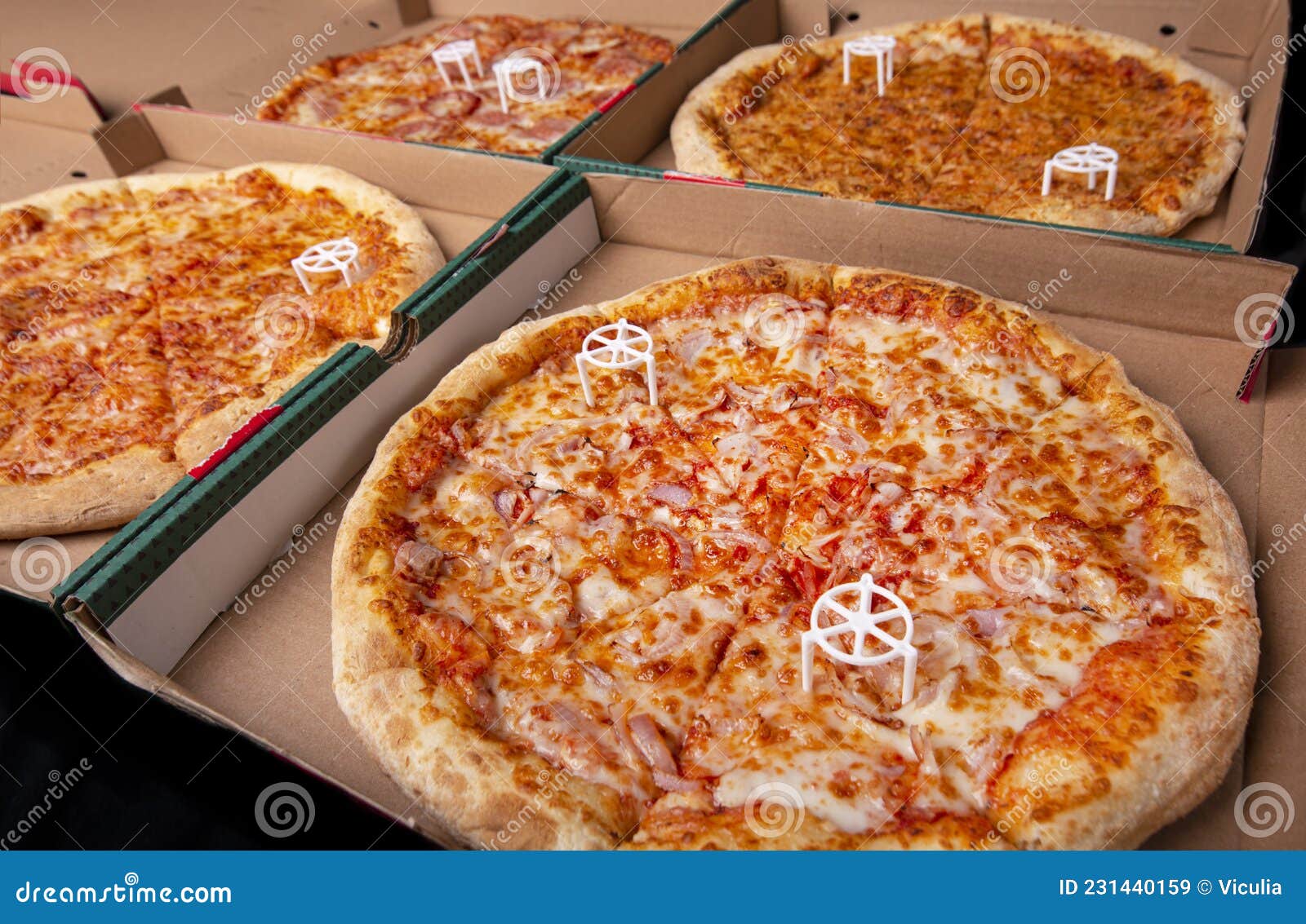 Pizzas in a Cardboard Boxes Against a Dark Background Stock Image ...