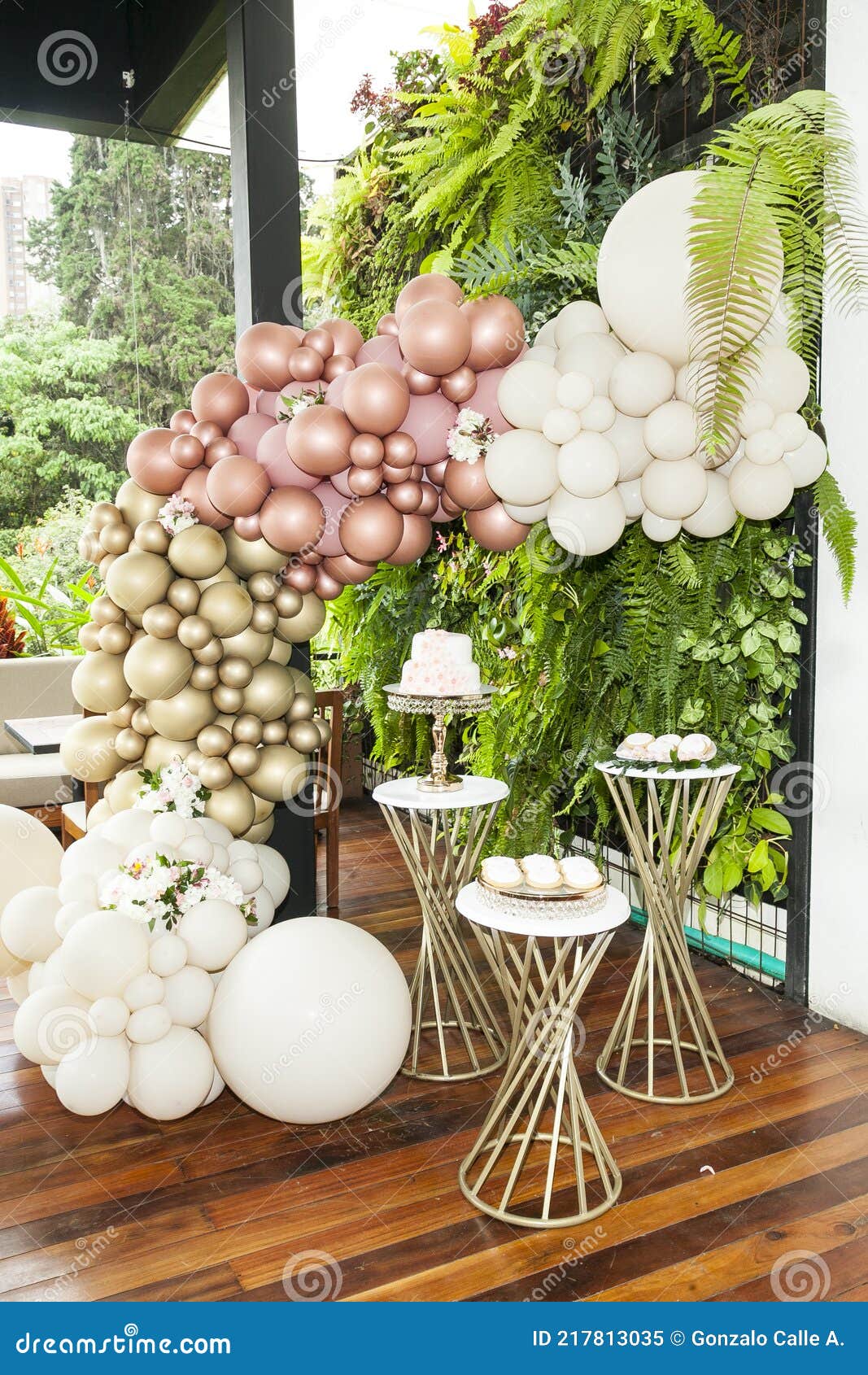 Place Decorated with Balloon Arch, Sweets and Cake for Reception ...