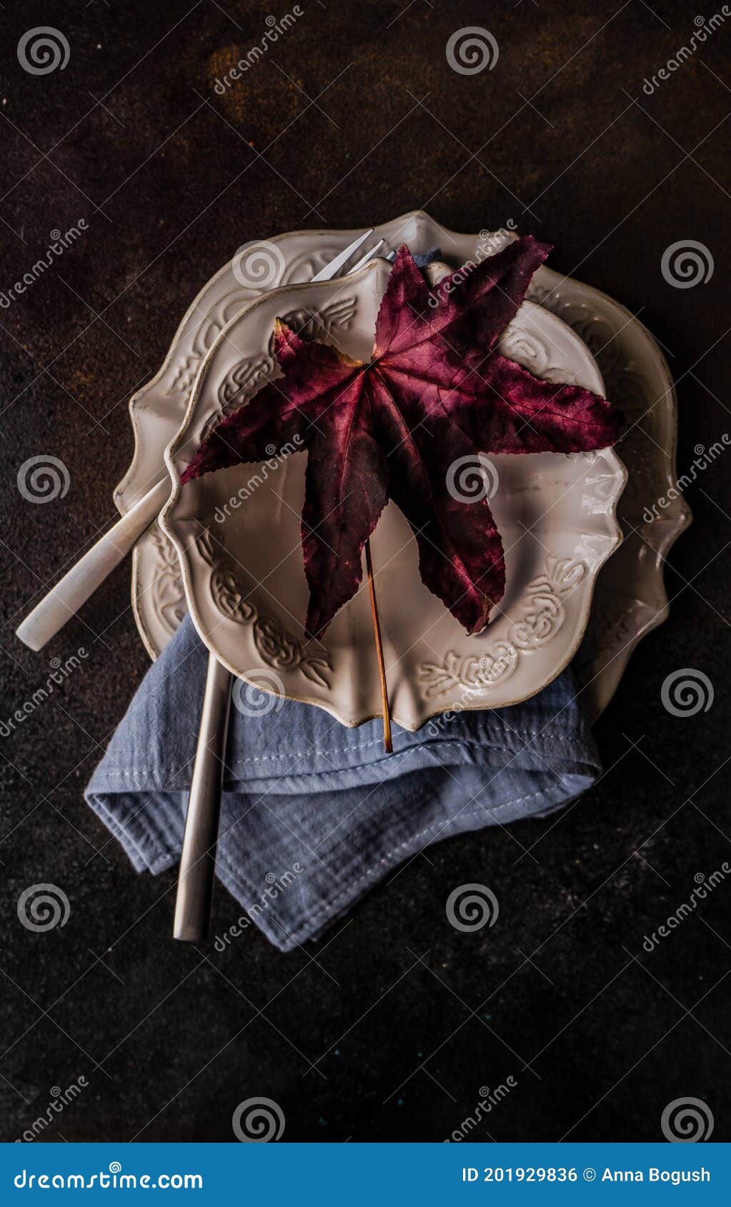 Place Setting with Grape Leaf Stock Photo - Image of concrete, autumn ...