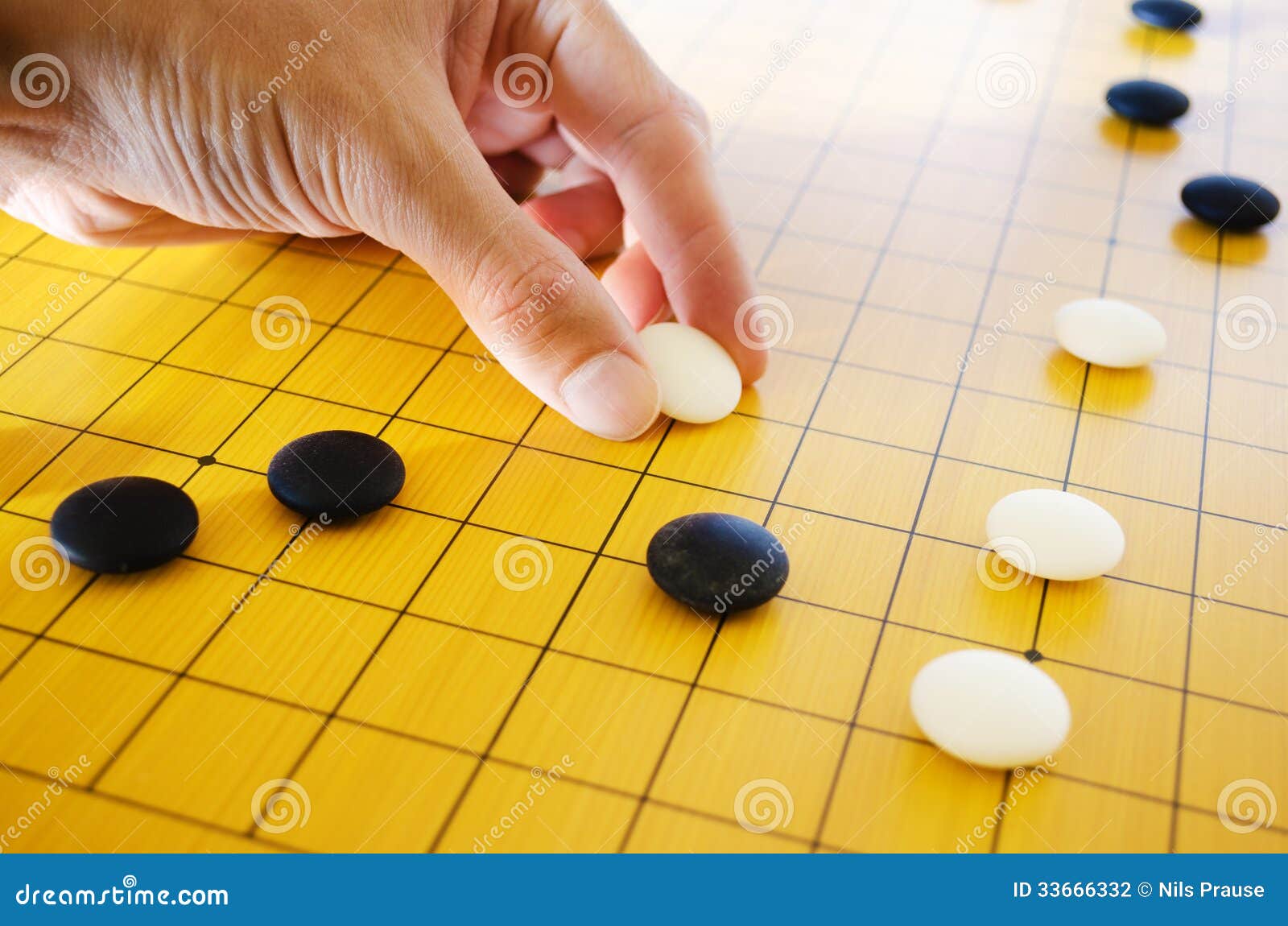 Placing Go Stone stock photo. Image of move, asia, asian - 33666332