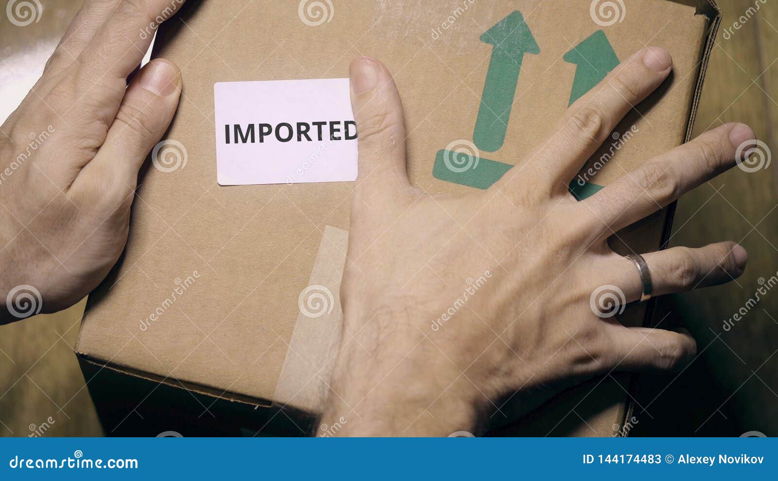 Placing Sticker with IMPORTED Text on the Box Stock Image - Image of ...