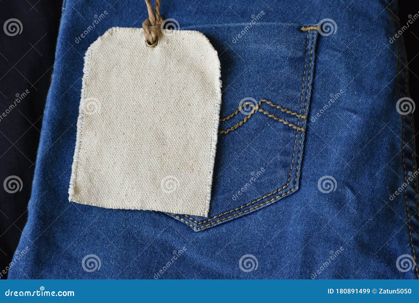Plain Clothing Tag on Jeans Background Stock Image - Image of string ...