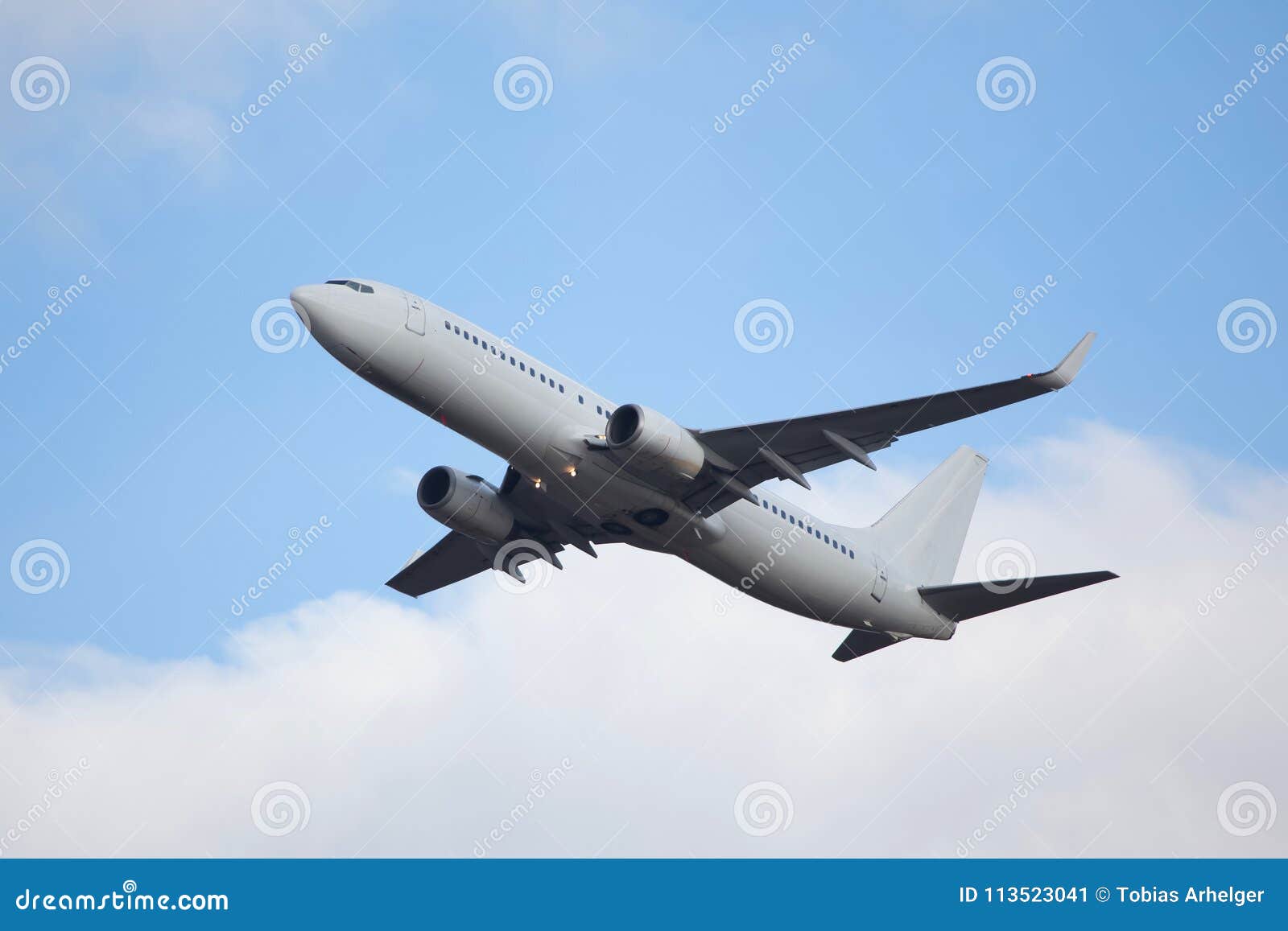 Plain Passenger Airplane Starting in a Cloudscape Stock Image - Image ...