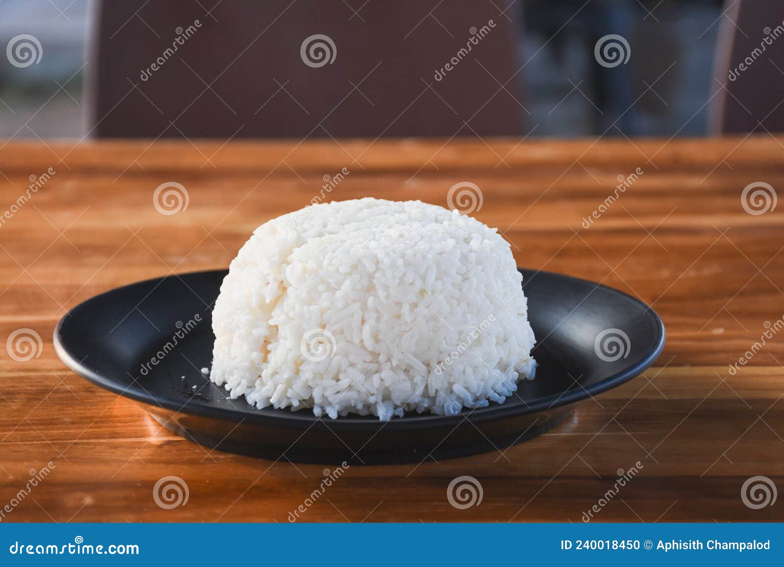 Plain Rice on a Black Plate on the Table Stock Photo - Image of ...