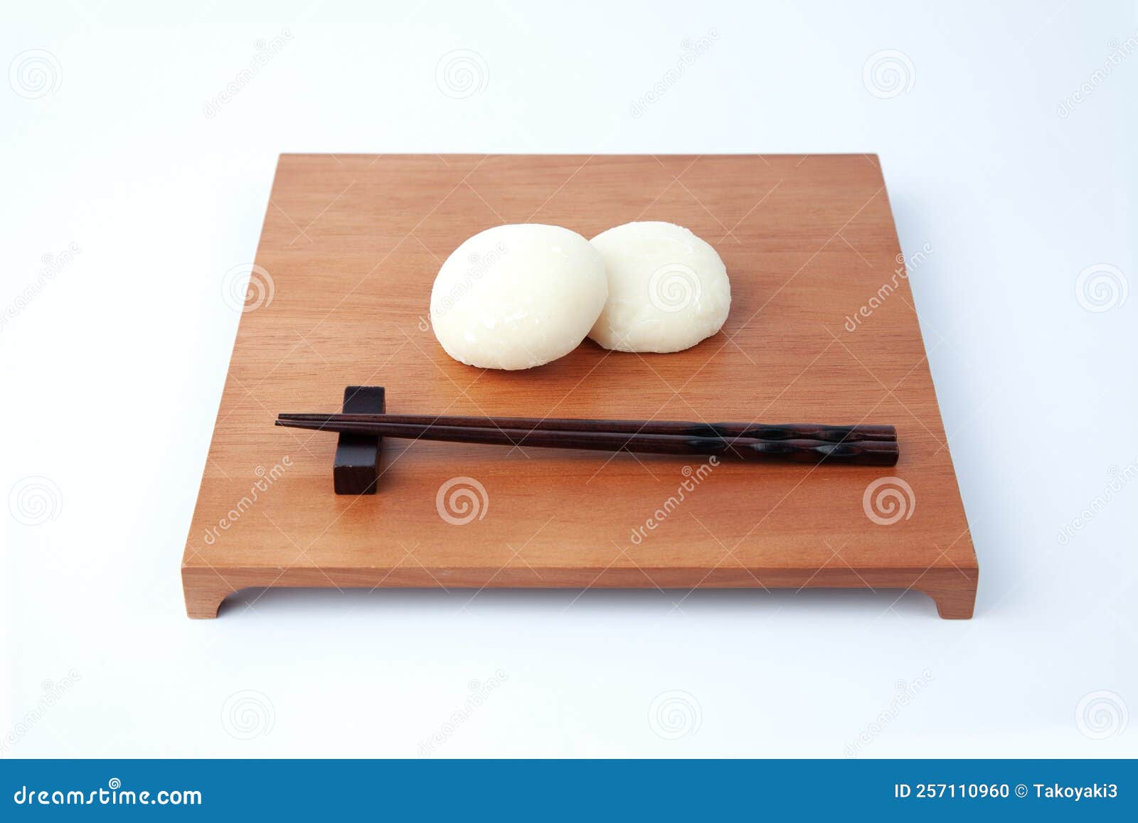 Plain Rice Cake on Plate Isolated on White Background Stock Photo ...