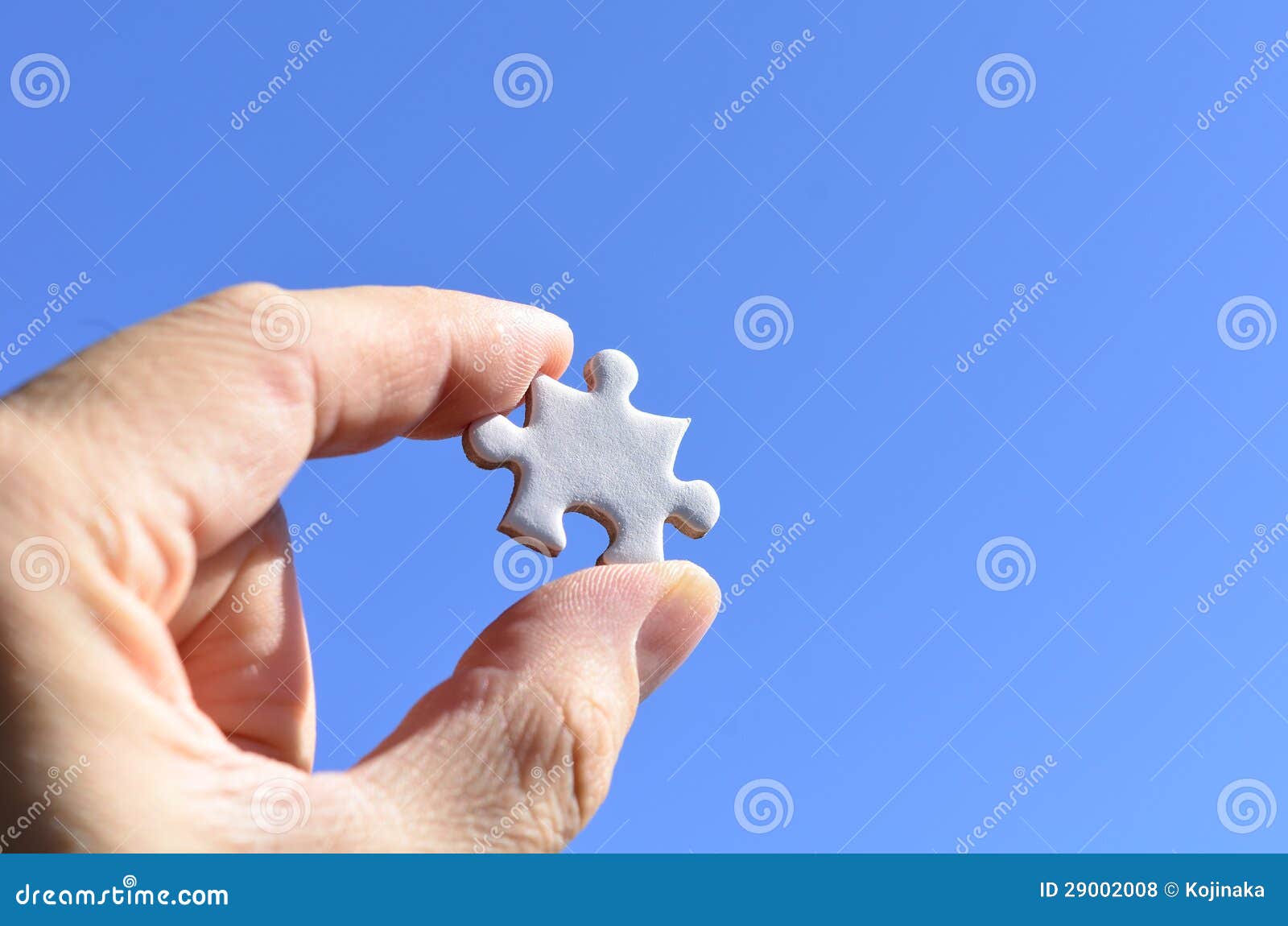 Plain white jigsaw puzzle stock photo. Image of patience - 29002008