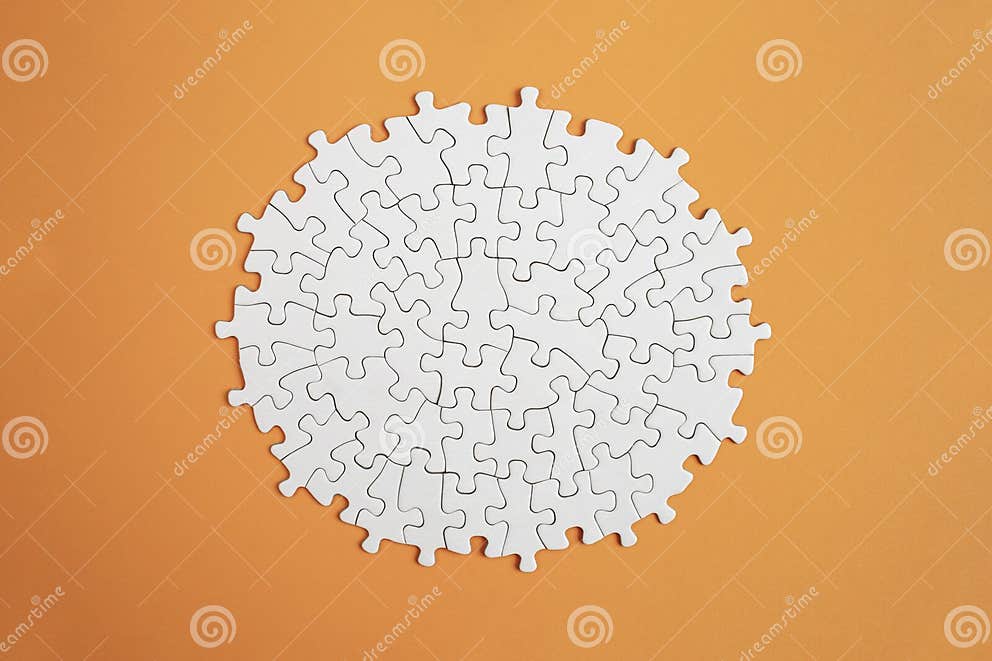 Plain White Jigsaw Puzzle on Orange Color Background, Oval Shaped Frame ...