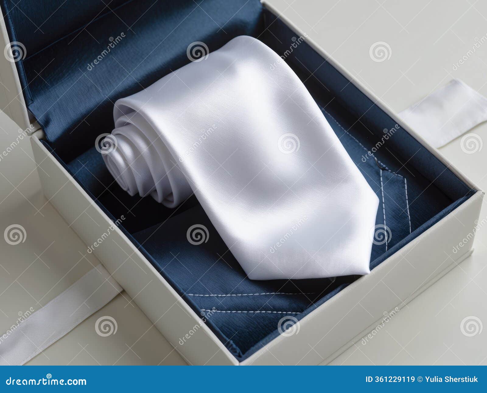 A Plain White Silk Tie, Presented in an Open Luxury Box with a Smooth ...