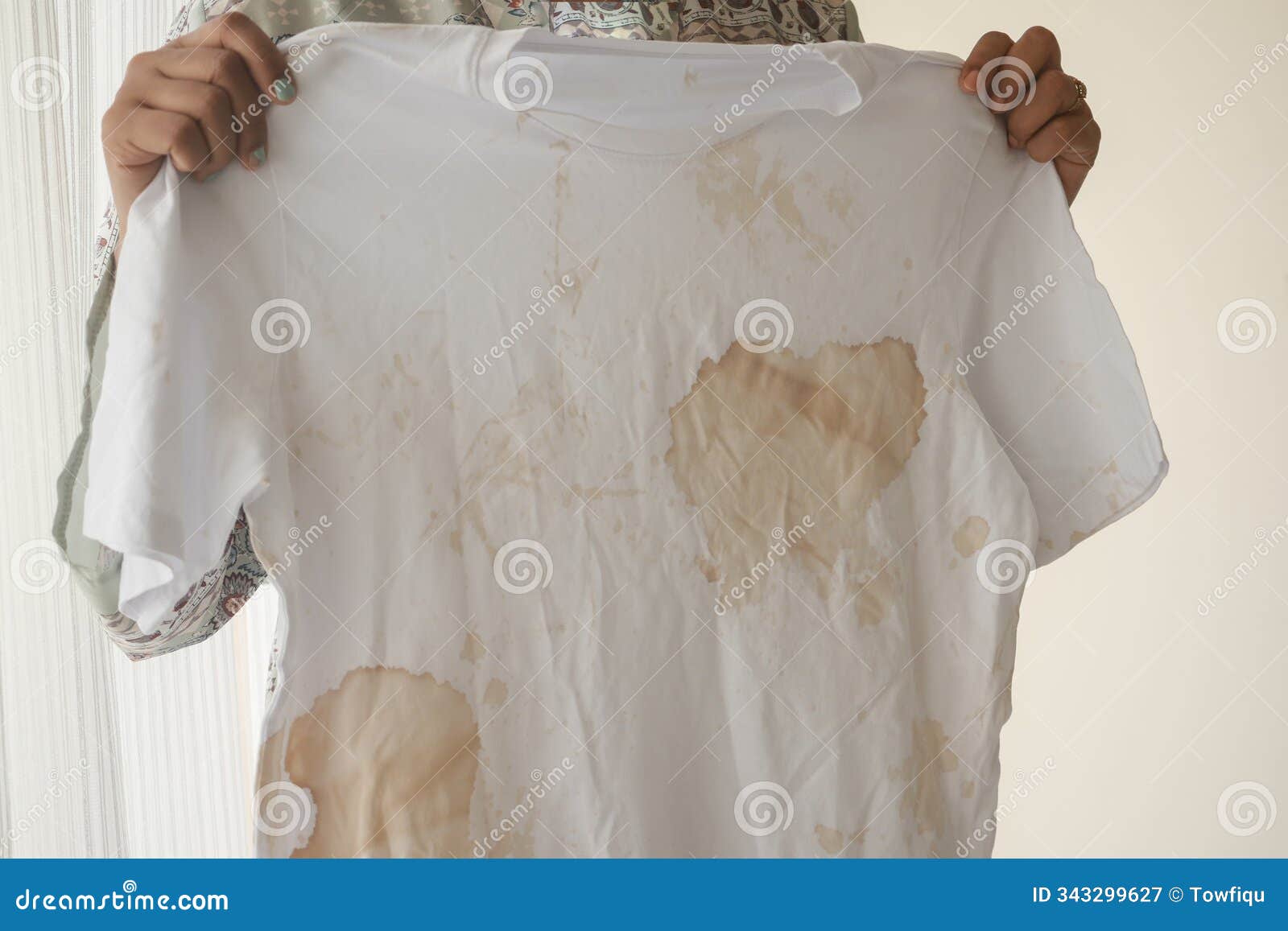 A Stained White TShirt that Features Noticeable Marks and Unpleasant ...