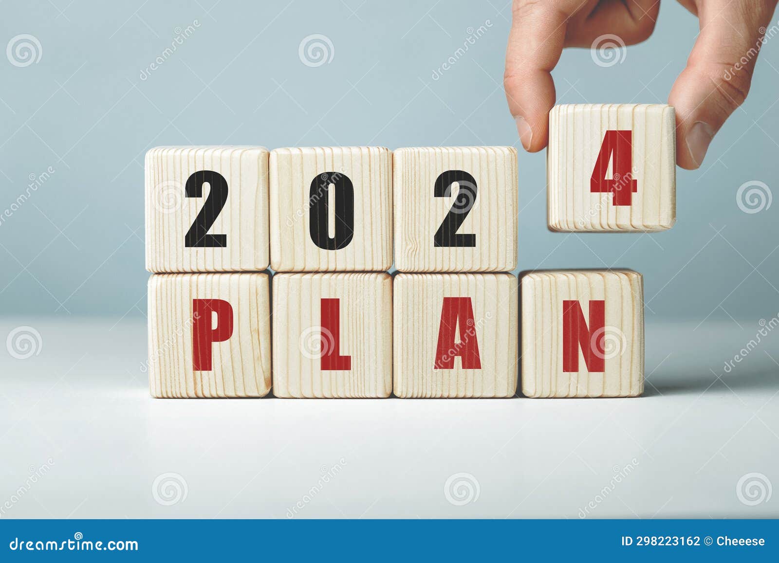 2024 Plan New Year Symbol. Turned A Wooden Cube And Changes Words Plan ...