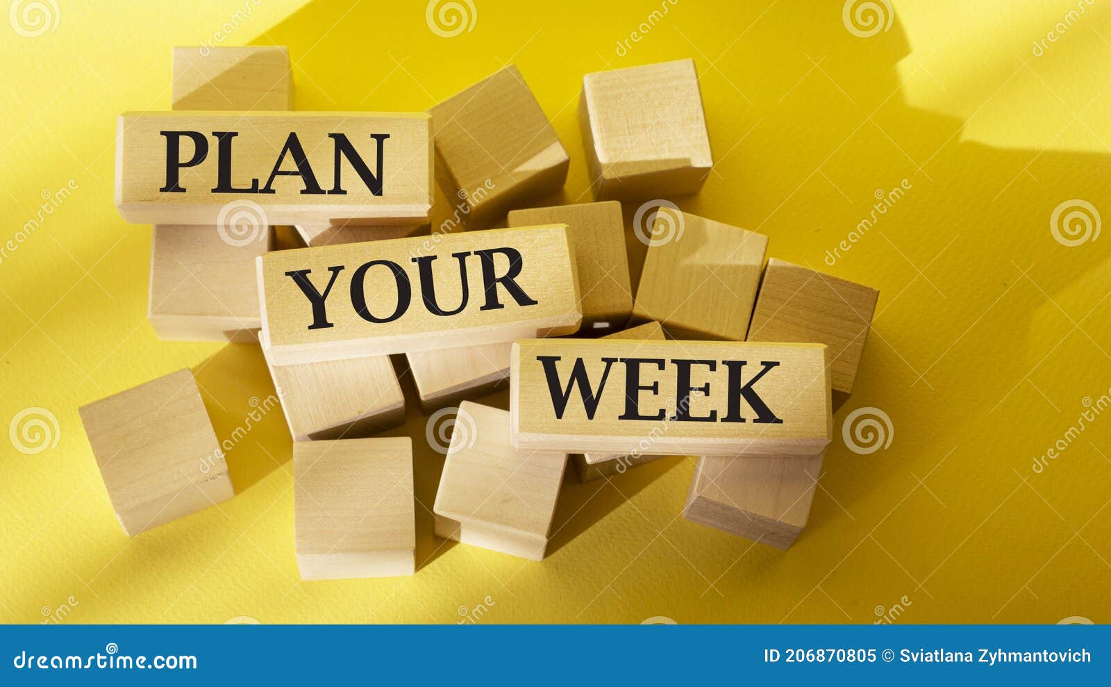 Plan Your Week, Text is Written on Wooden Blocks and on Yellow ...