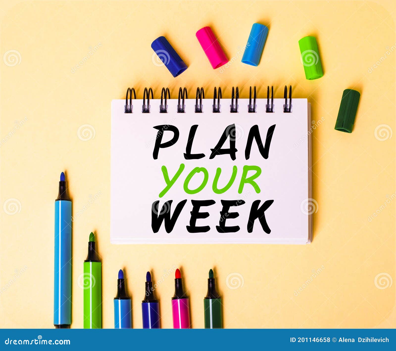 PLAN YOUR WEEK Written in a White Notebook on a Beige Background Near ...