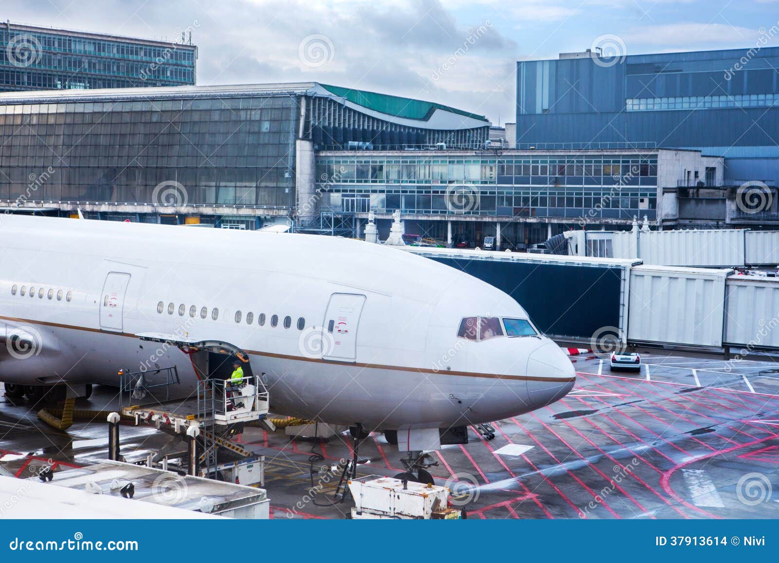 Plane at Airport Terminal stock photo. Image of boeing - 37913614