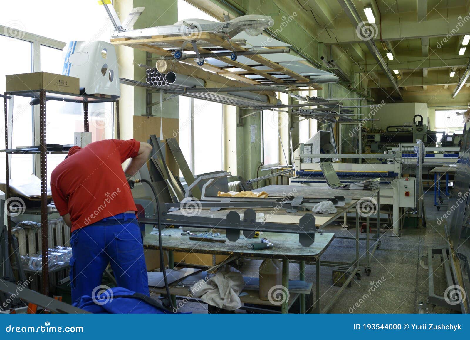 Worker Assembling Fuselage of a Light Passenger Plane at the Assembly ...
