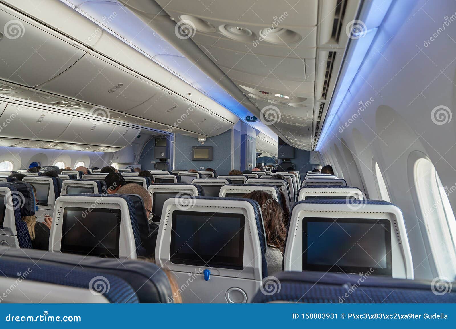 Plane cabin interior editorial photo. Image of full - 158083931