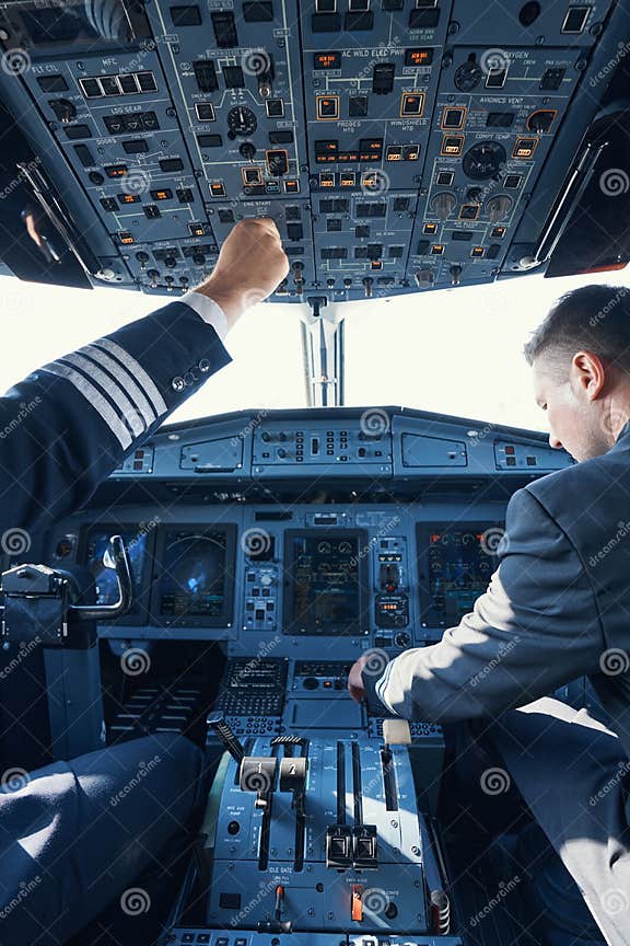 Plane Captain Toggling Switch on Cockpit Control Panel Stock Photo ...