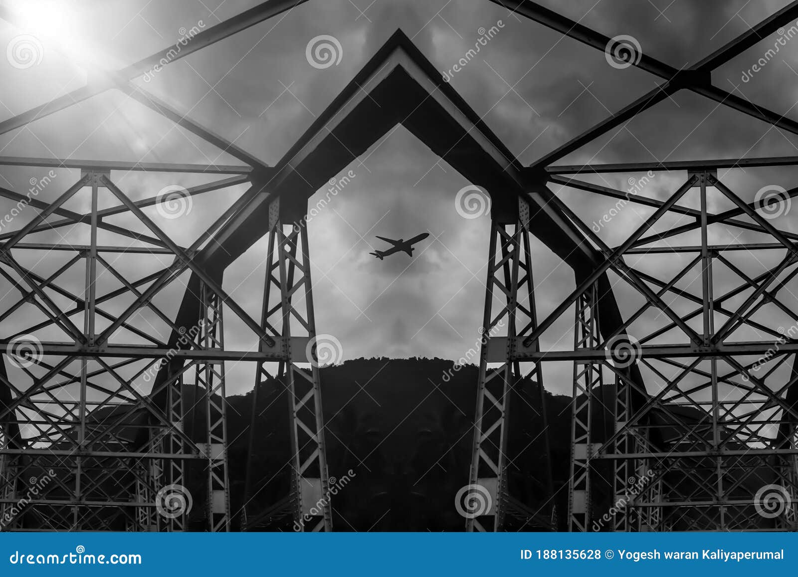 A Plane that is Crossing Over a Bridge Stock Photo - Image of plane ...