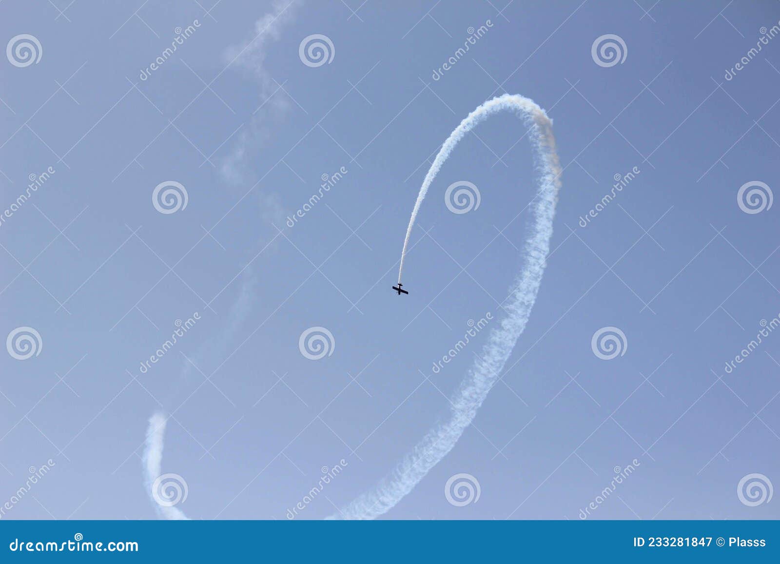 A plane doing acrobatics stock image. Image of flight - 233281847