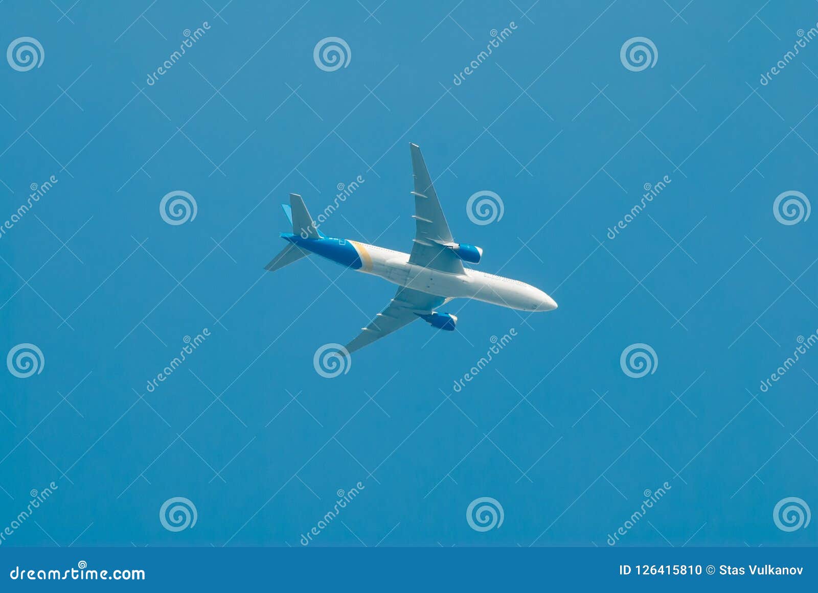 A White Plane with a Blue Tail Stock Photo - Image of luxury ...