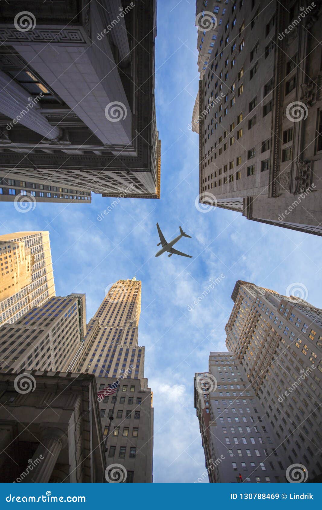 Plane Flies Over the City Over New York Stock Image - Image of plane ...