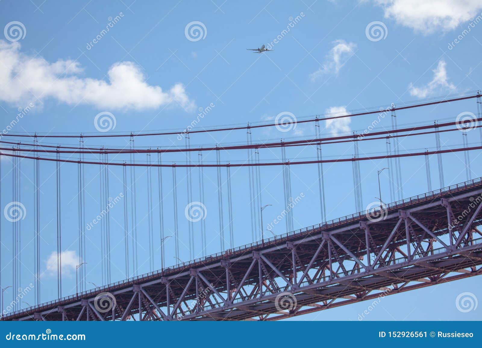 Plane Flies Over the Bridge Stock Image - Image of outdoor, cable ...