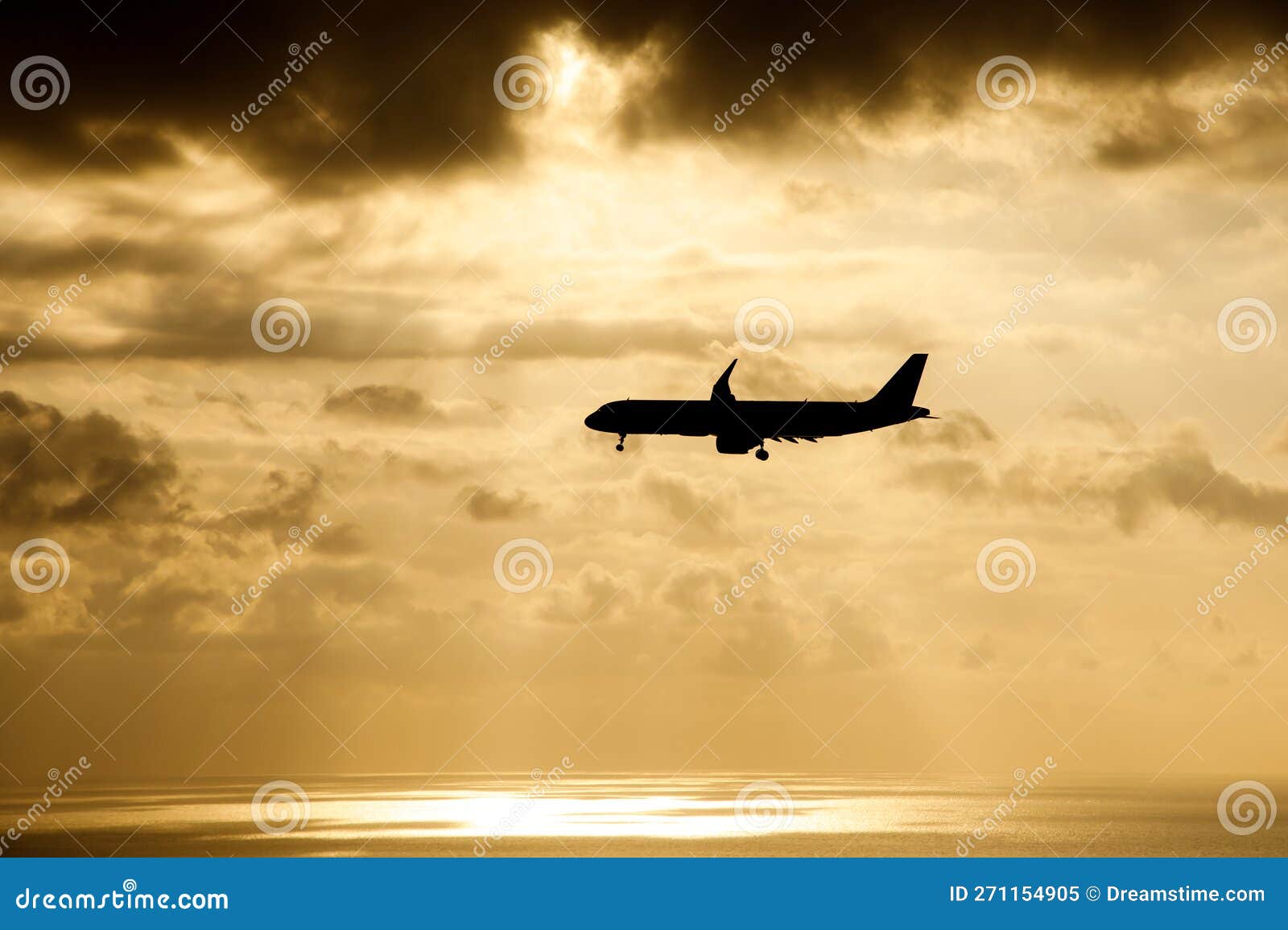 The Plane Flies Over the Sea in the Sun Rays. Stock Image - Image of ...